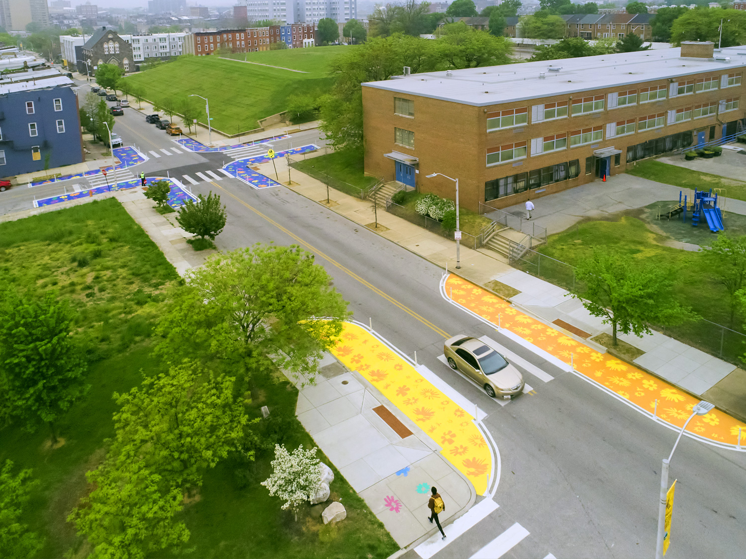 Surrounding a school with safe crossings | Asphalt Art
