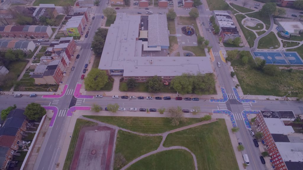 Surrounding a school with safe crossings | Asphalt Art