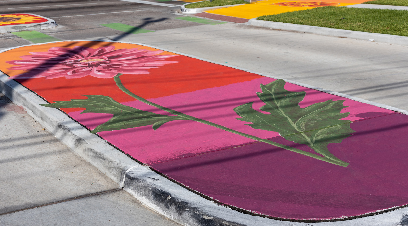Augmenting intersection enhancements with colorful designs | Asphalt Art
