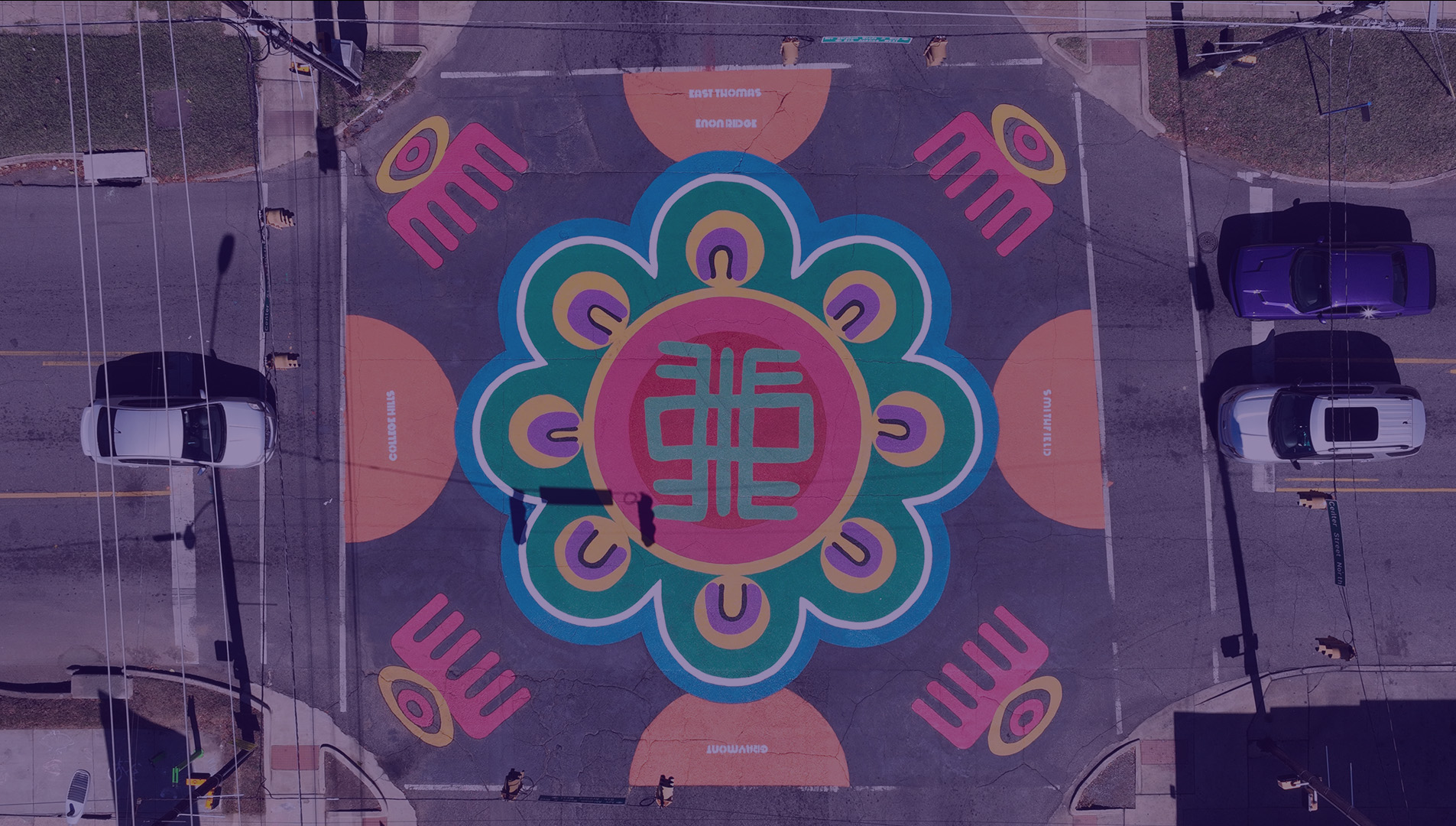 Activating a neighborhood hub with an intersection mural | Asphalt Art