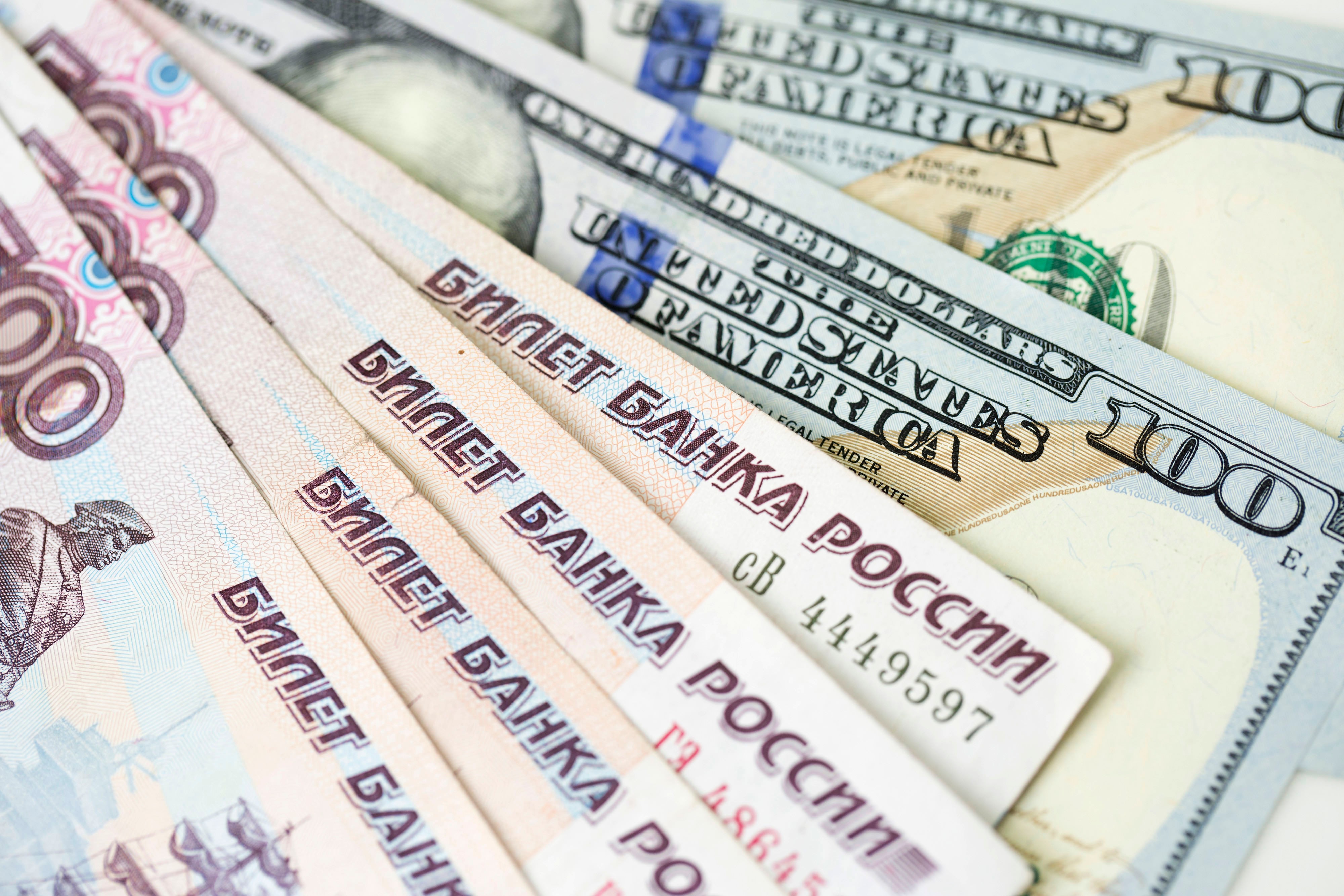 Russian FX traders see U.S. dollar largely in '55-60' ruble range by ...